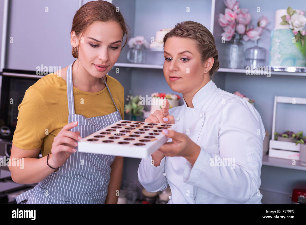 Woman chocolates hi-res stock photography and images - Alamy