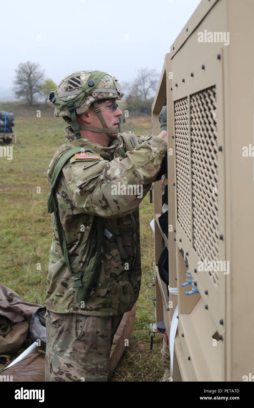 U.S. Army Capt. Timothy Moore, commander of Headquarters Battery, 1st ...
