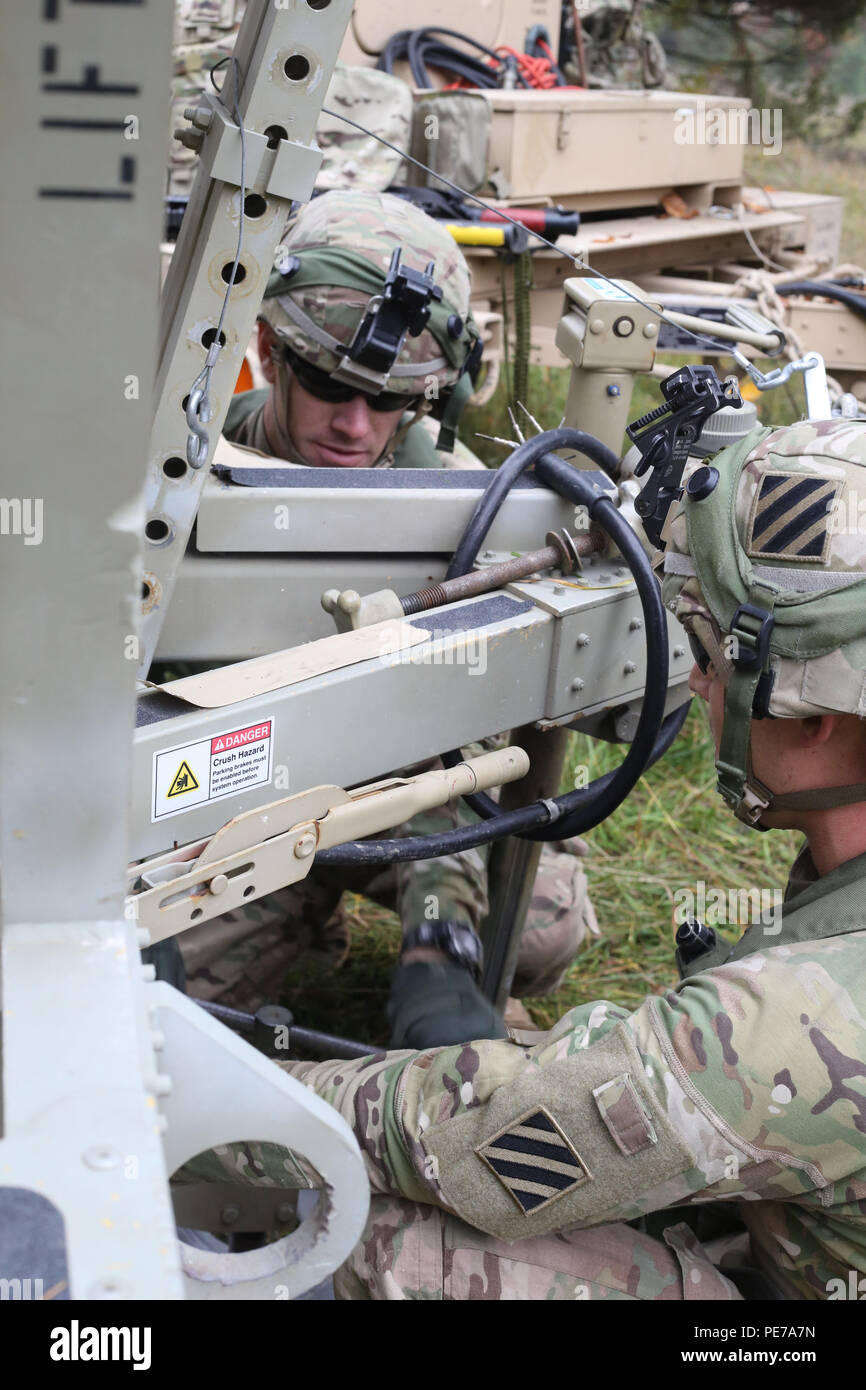 U.S. Army Staff Sgt. Terry Spangler, left, and Spc. Andrew Johnson ...