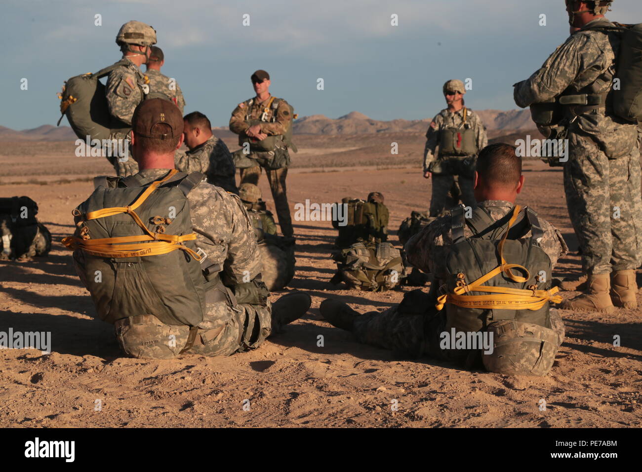 U.S. Army paratroopers assigned to Tarantula Team, Operations Group sit ...