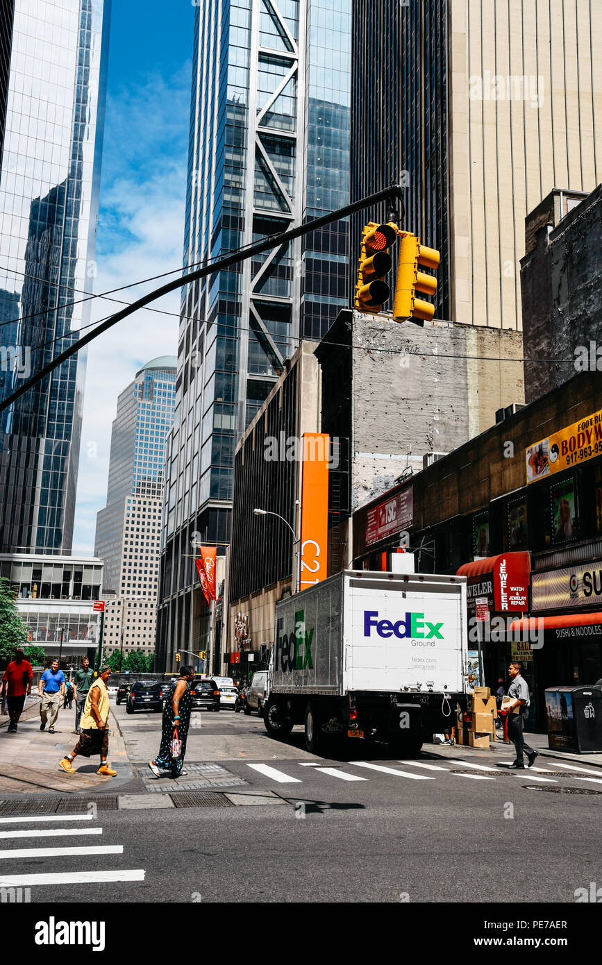 New York City, USA - June 20, 2018: Fedex truck shipping in crowded ...