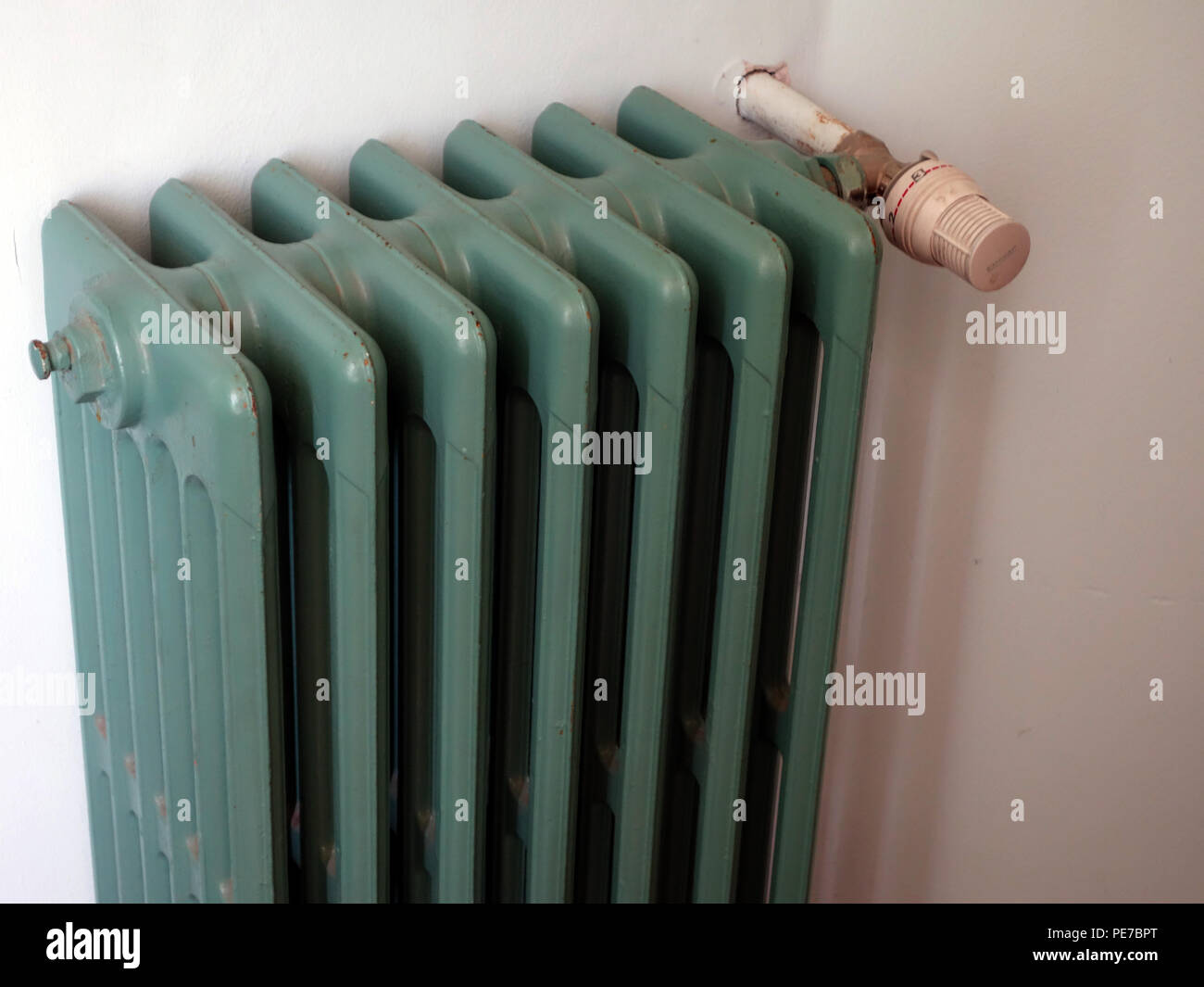 French Vintage cast iron radiator Stock Photo - Alamy