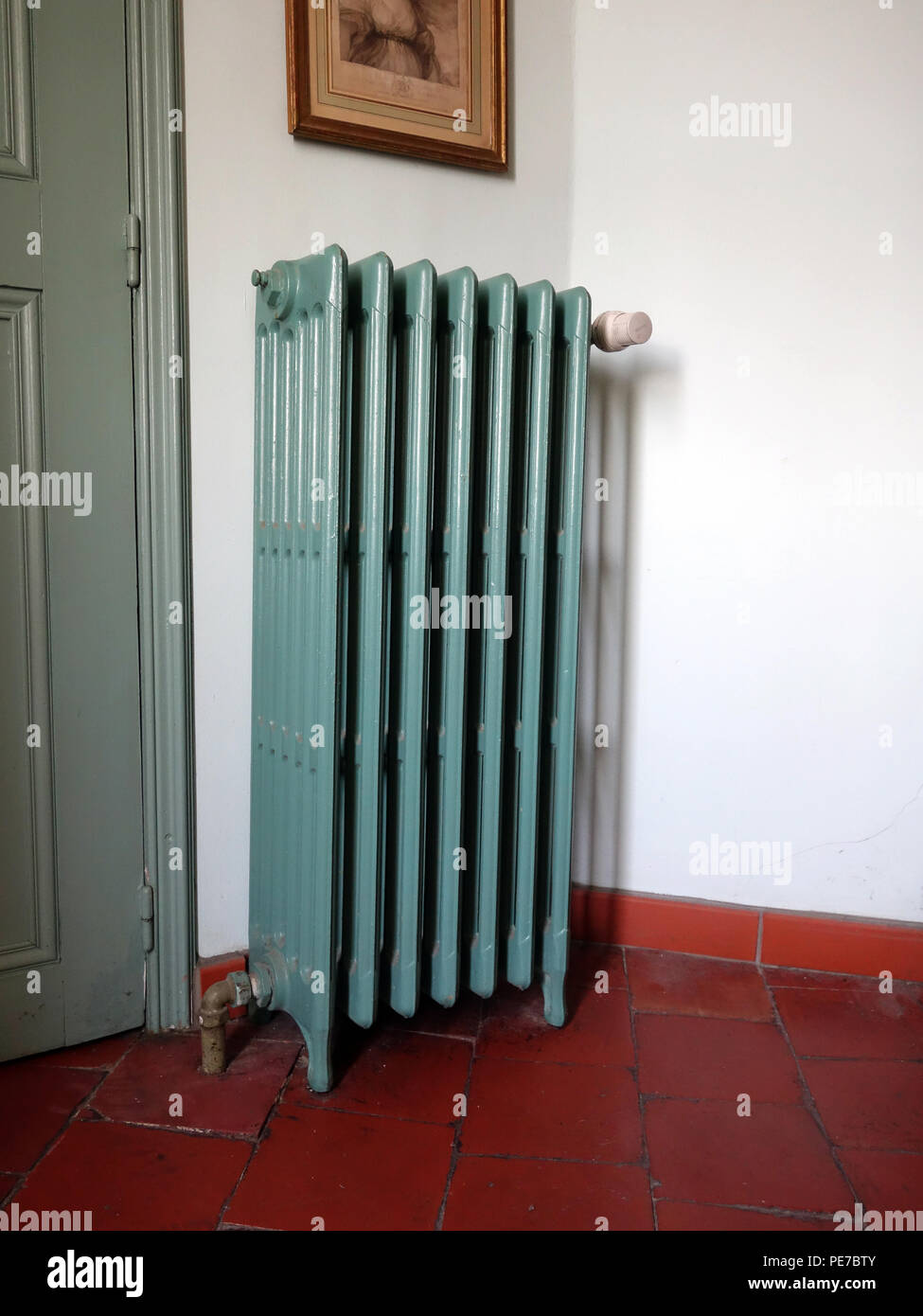 French Vintage cast iron radiator Stock Photo - Alamy