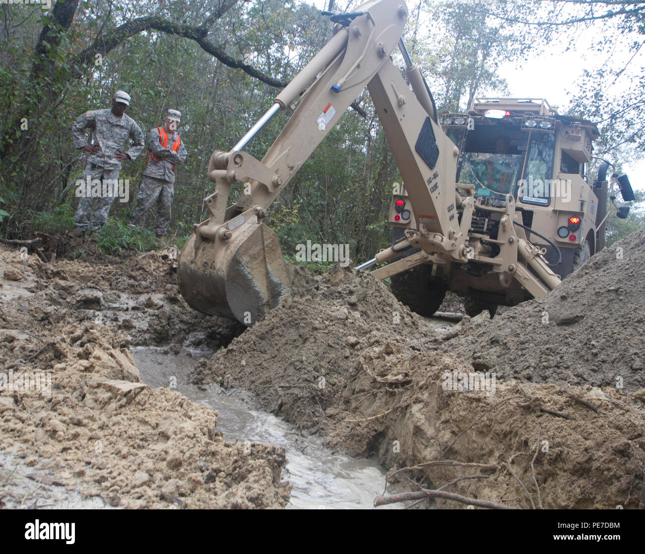 U.S. Army engineers with the South Carolina National Guard repair roads ...