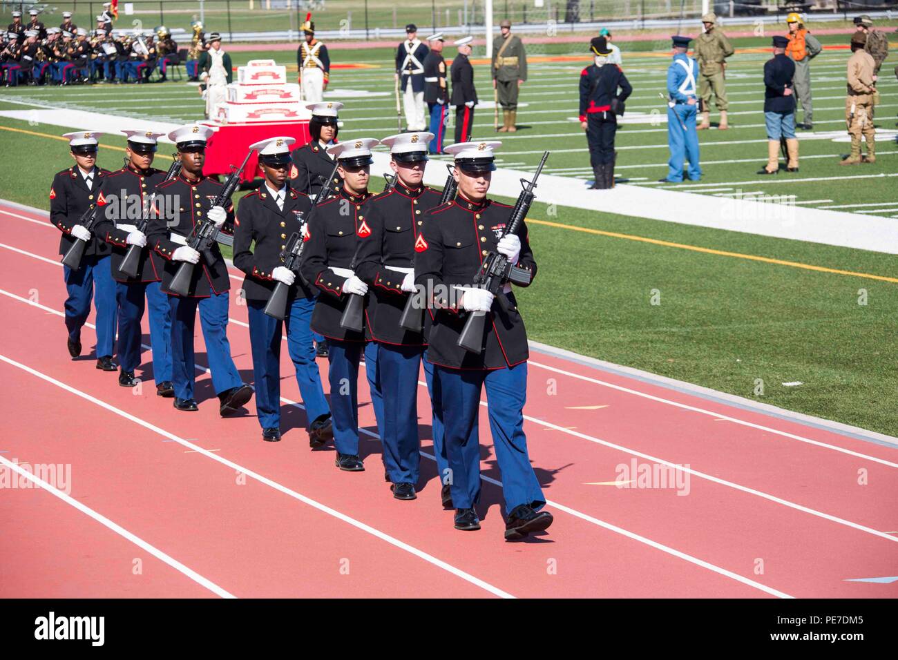 The rifle detail marches off the field during the Joint Daytime ...