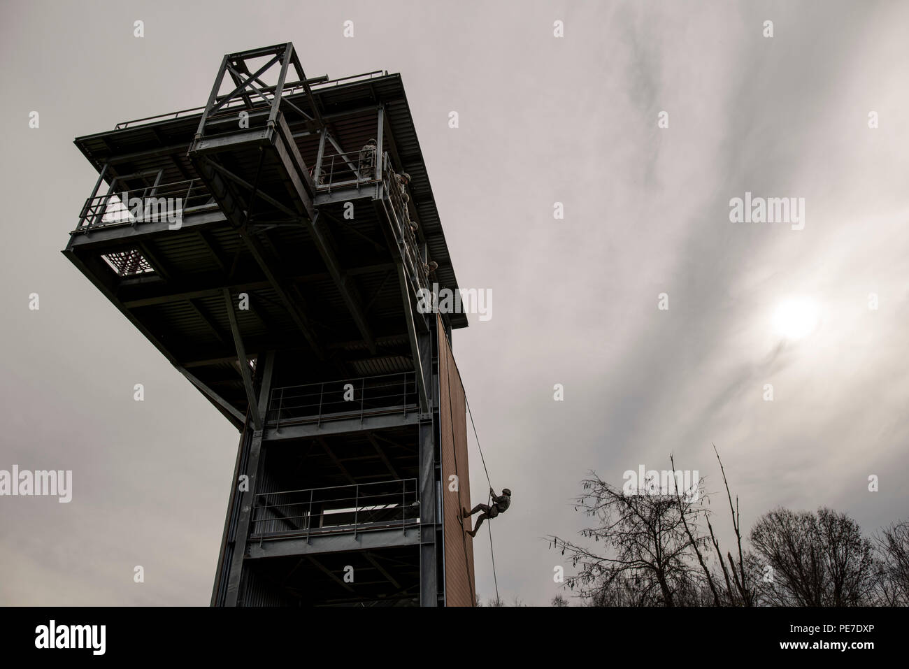 A U.S. Army Reserve military police Soldier rappels down a 40-foot ...