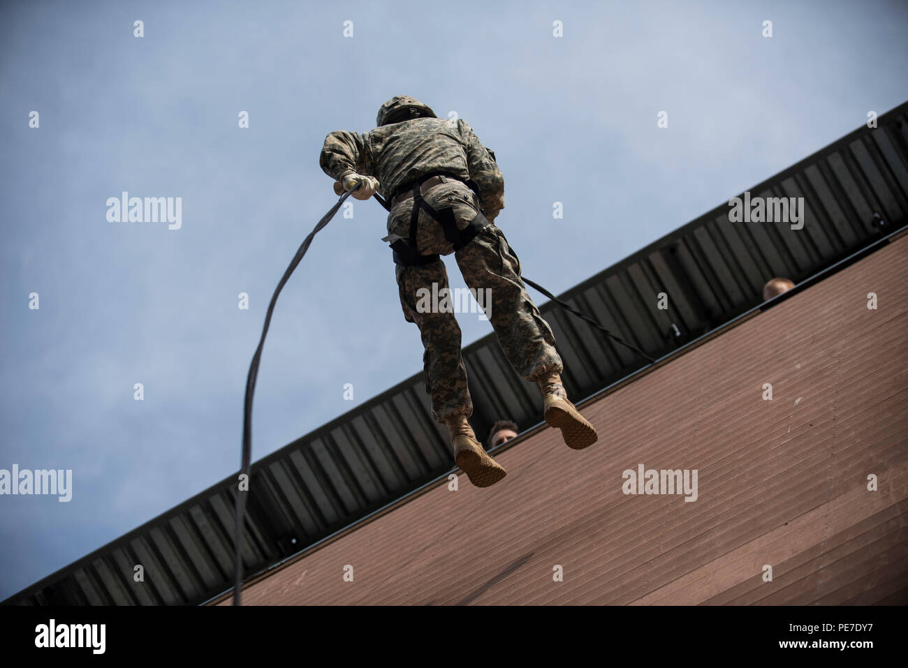A U.S. Army Reserve military police Soldier rappels down a 40-foot ...