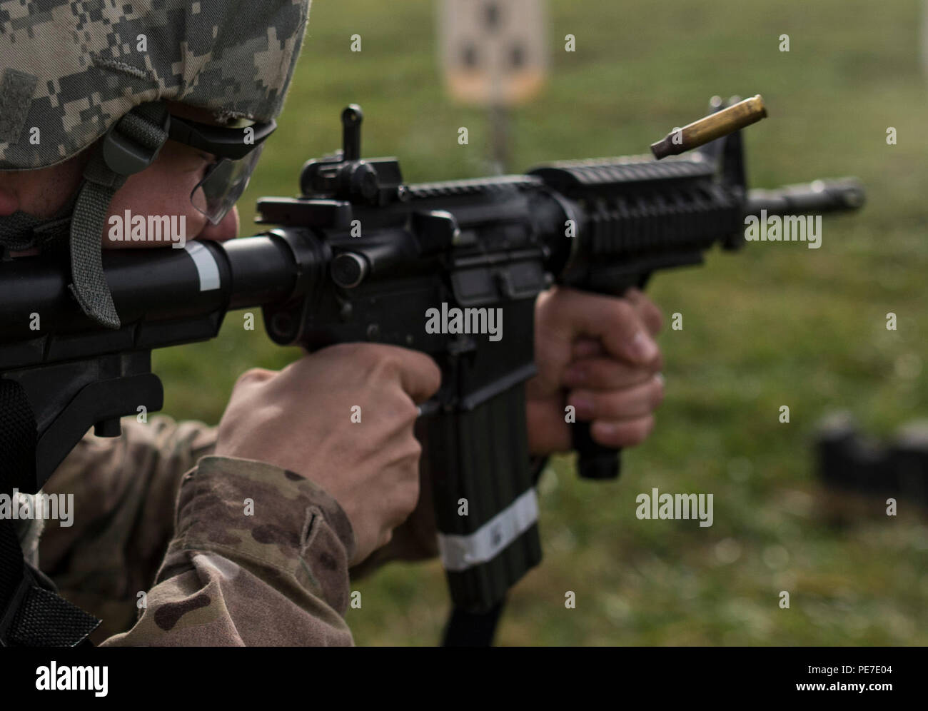 A U.S. Army Reserve military police Soldier shoots a target during ...