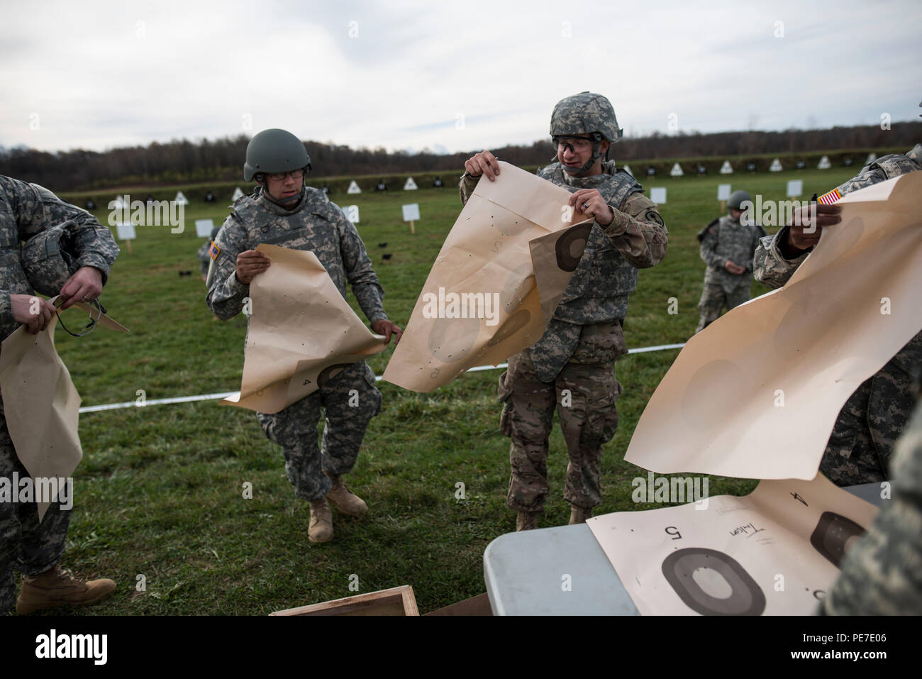 U.S. Army Reserve military police Soldiers turn in their targerts after ...