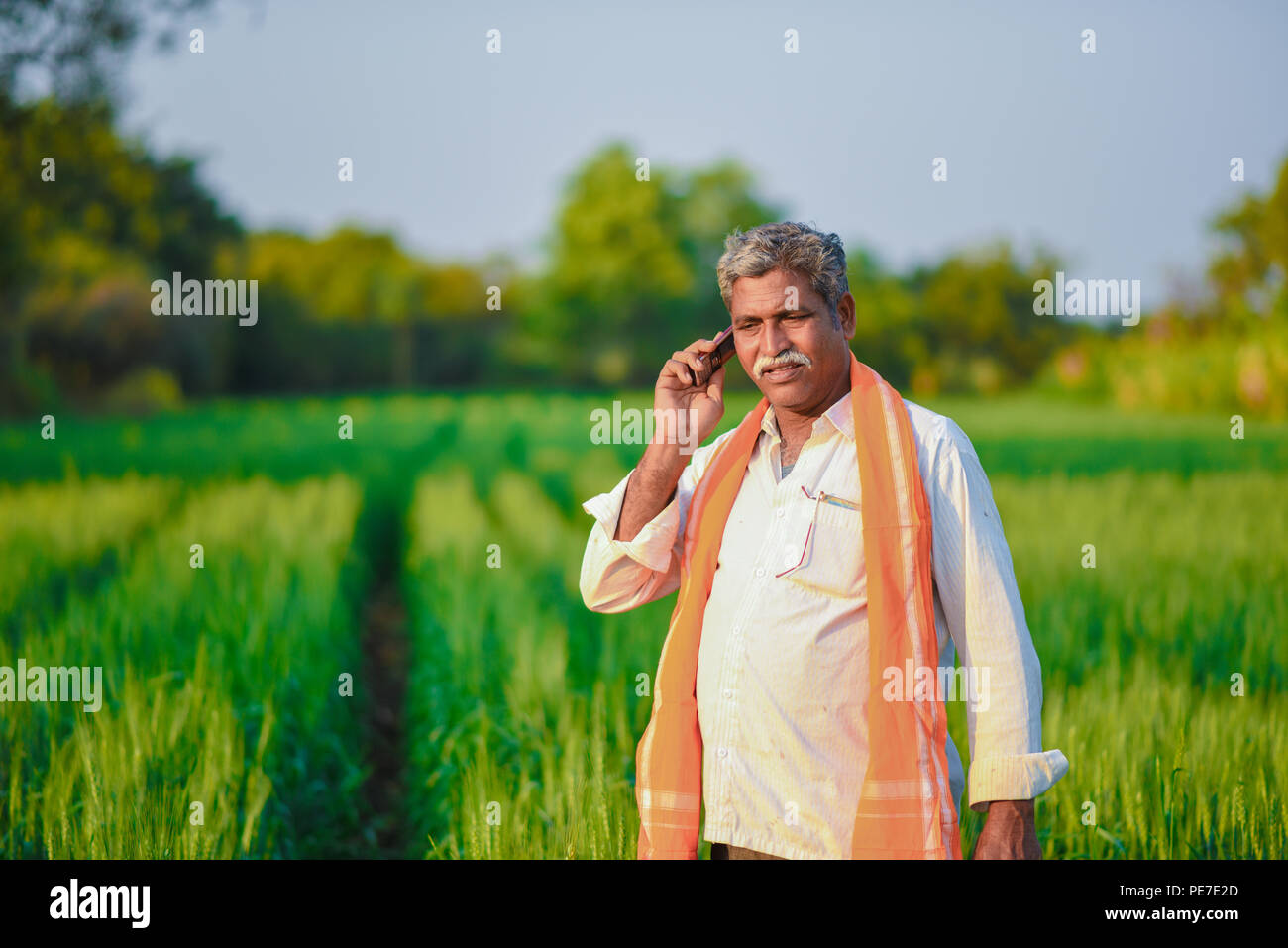 Indian old man talking on hi-res stock photography and images - Alamy