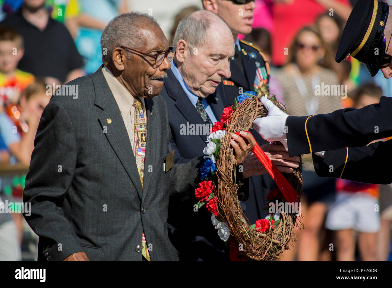 Retired U.S. Army Col. Reginald C. Grier, left, and retired U.S. Navy ...