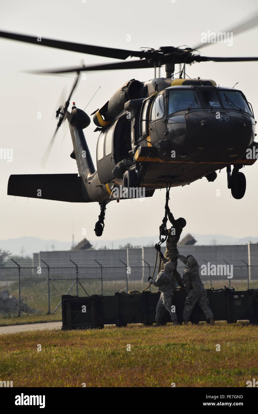 A flight crew from Alpha Company, 2-2 Assault Helicopter Battalion ...