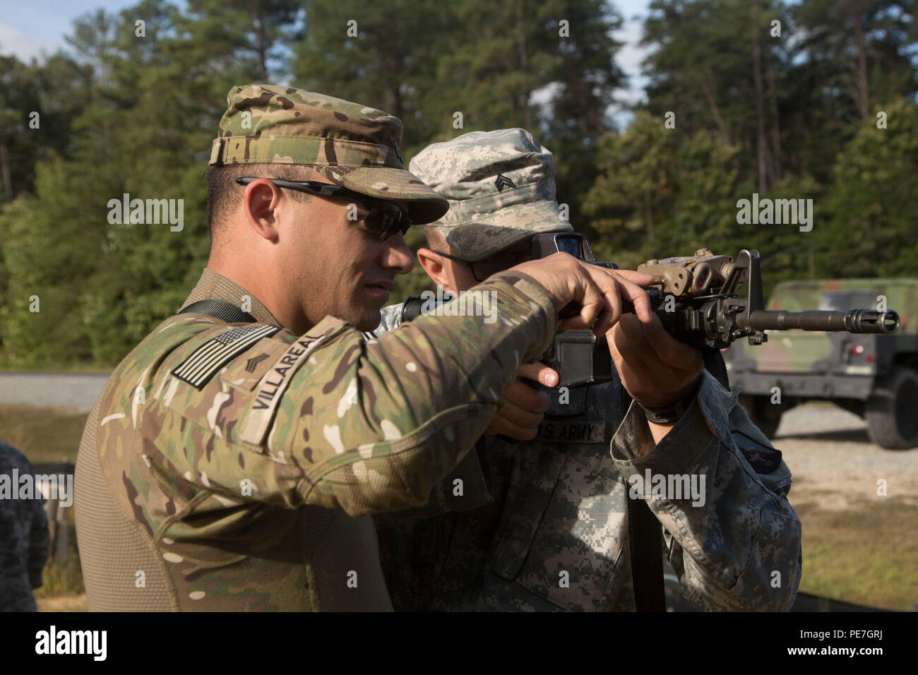 U.S. Army Sgt. Timothy Villareal and Sgt. Paul Sale, both assigned to ...