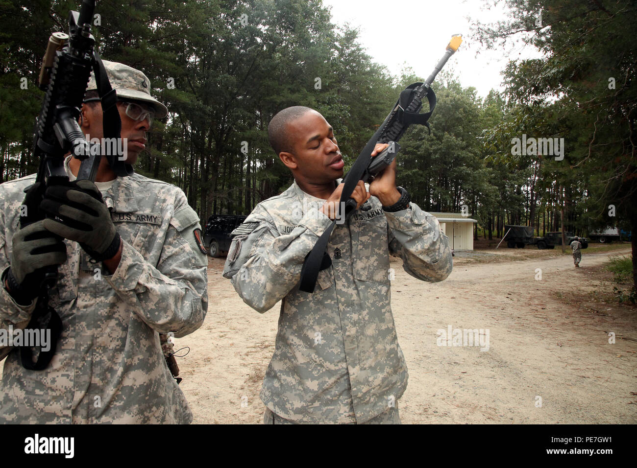U.S. Army 1st Sgt. Endesha Johnson, assigned to 55th Signal Company (Combat Camera), inspects ...