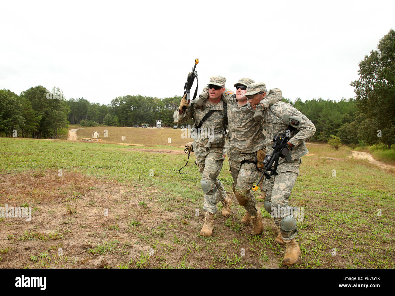 U.S. Soldiers assigned to 55th Signal Company (Combat Camera), carry a ...