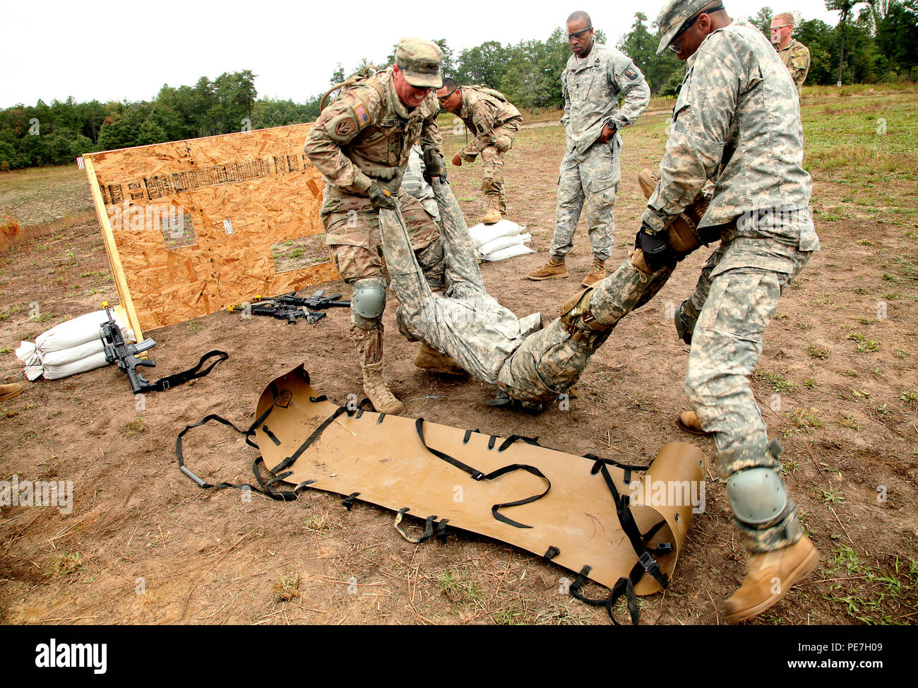 U.S. Soldiers assigned to 55th Signal Company (Combat Camera), moves a ...