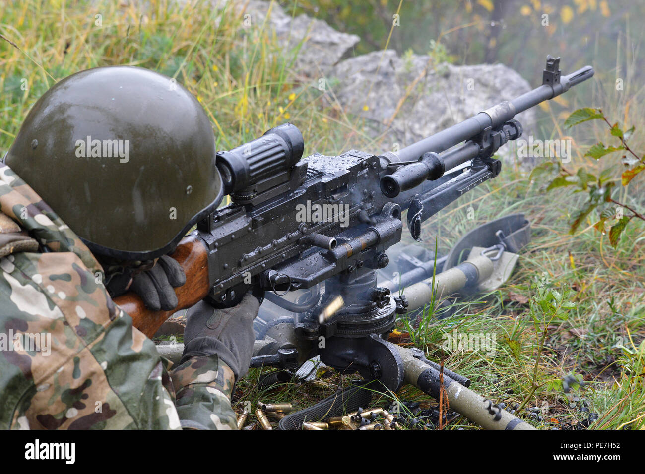 Slovenian army soldiers conduct a live-fire exercise with FM MAG ...