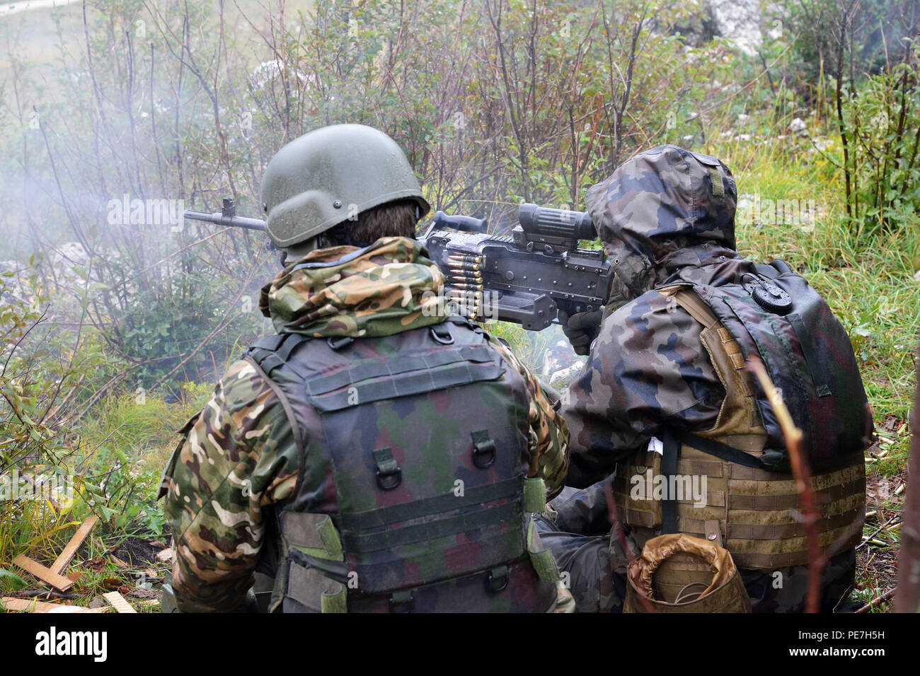 Slovenian army soldiers a live-fire exercise with FM MAG machine gun as ...