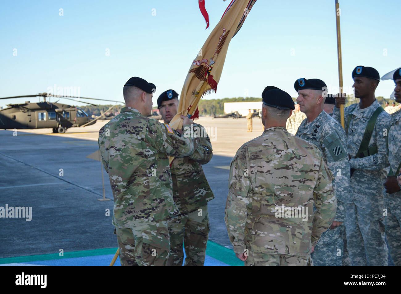 The 3rd Combat Aviation Brigade commander, Col. John D. Kline, hands ...