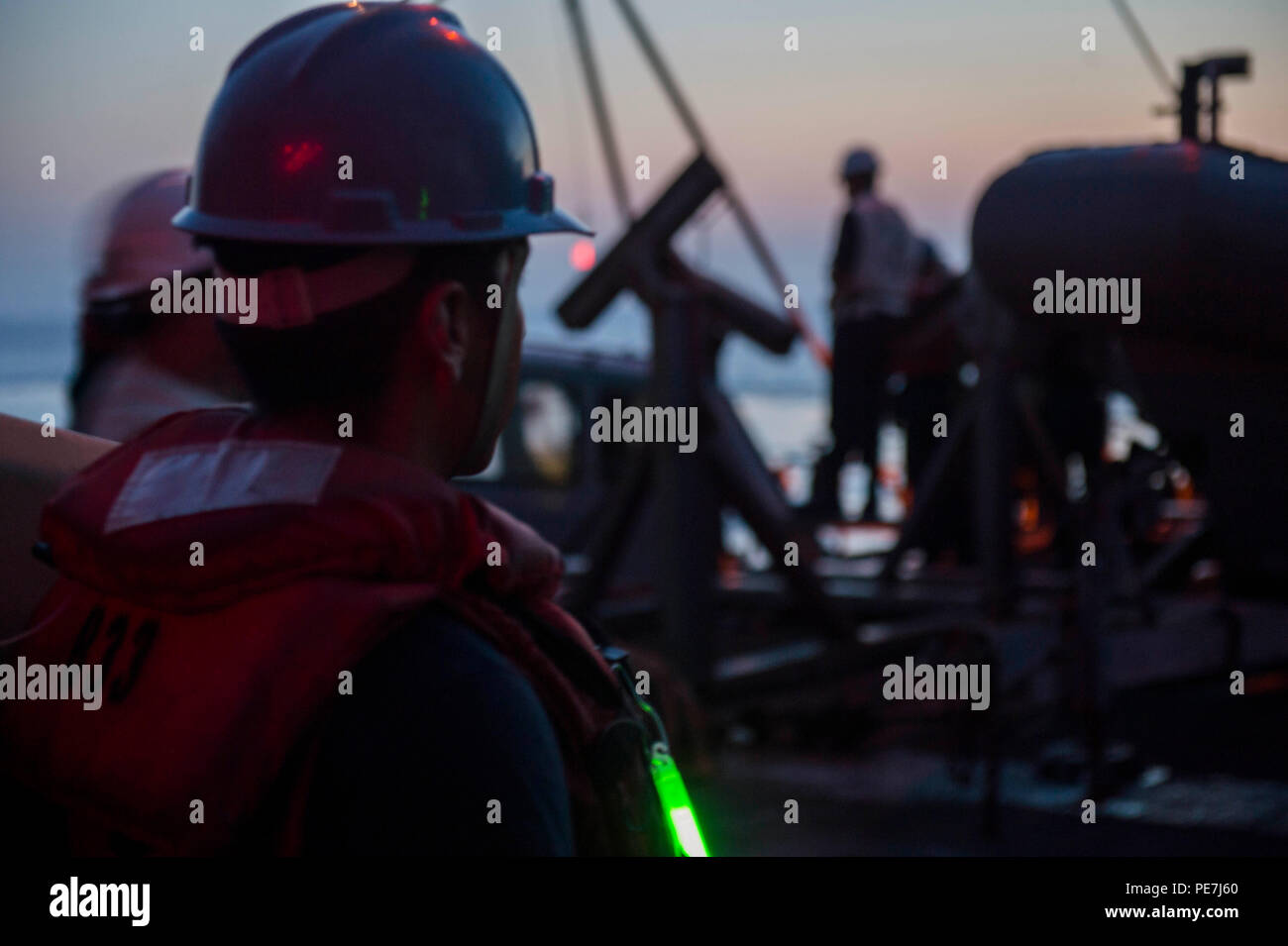 ARABIAN SEA (Oct. 14, 2015) Seaman Enrique Santoyo mans a line during ...
