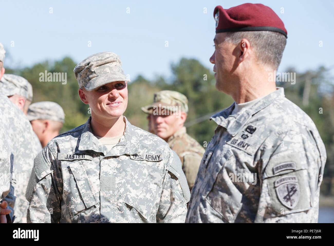 U.S. Army Reserve Maj. Lisa Jaster, left, became the third woman to ...