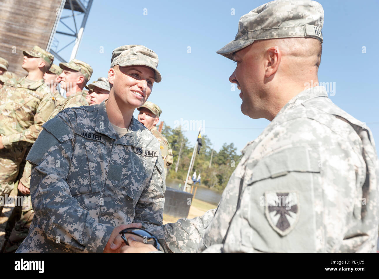 U.S. Army Reserve Maj. Lisa Jaster, left, became the third woman to ...