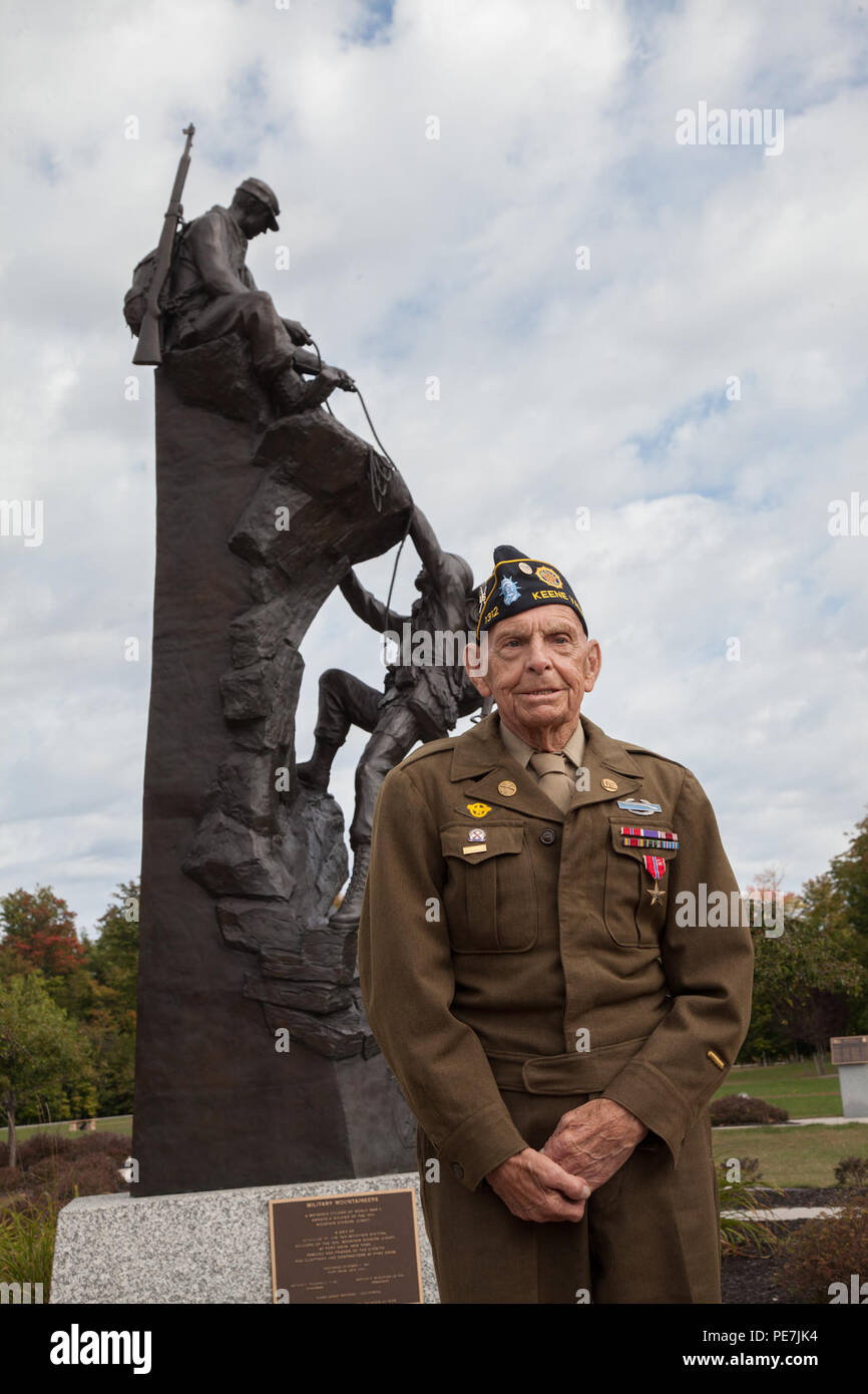 Charles Smith poses for a photo in front of the Military Mountaineers ...