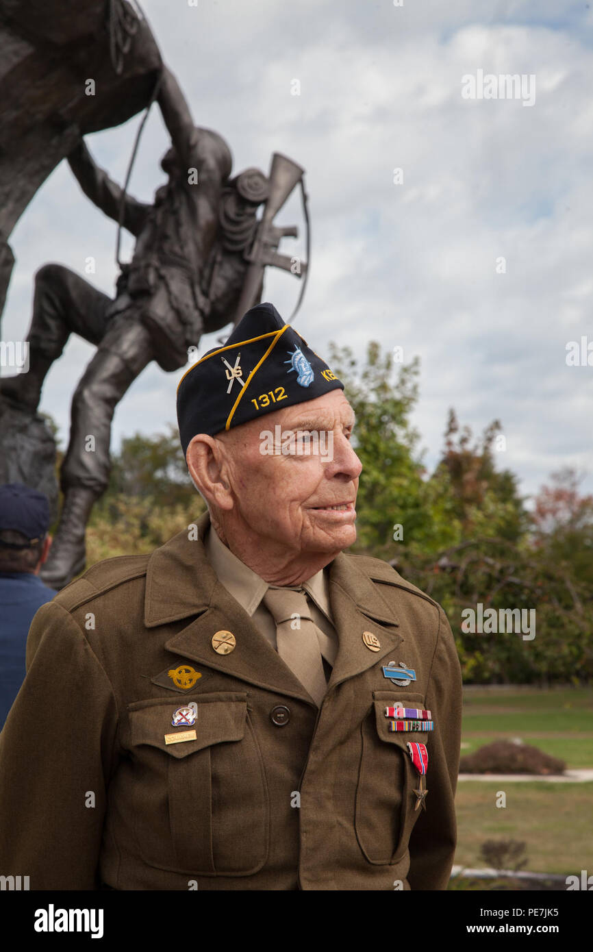 Charles Smith poses for a photo in front of the Military Mountaineers ...