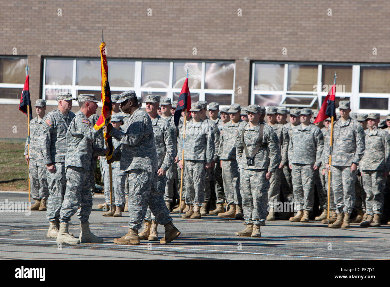 Indiana Army National Guard Lt. Col. Walter Finney passes the colors of ...