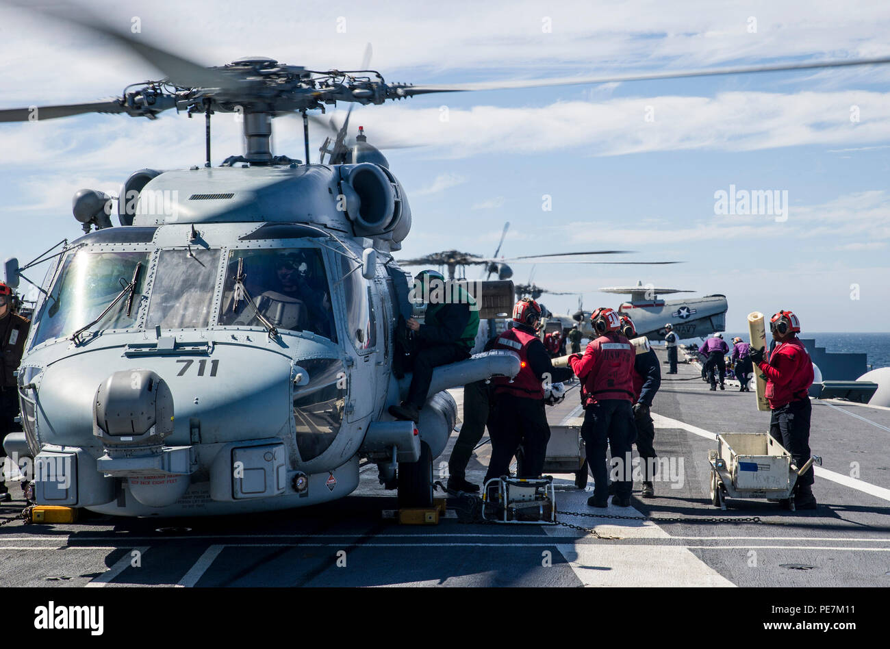 151017-N-EH855-303 PACIFIC OCEAN (Oct. 17, 2015) Sailors load sonobuoys ...