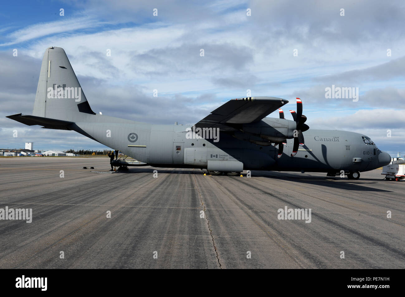 A Canadian C-130 Hercules, prepares for a pallet off load on the flight ...
