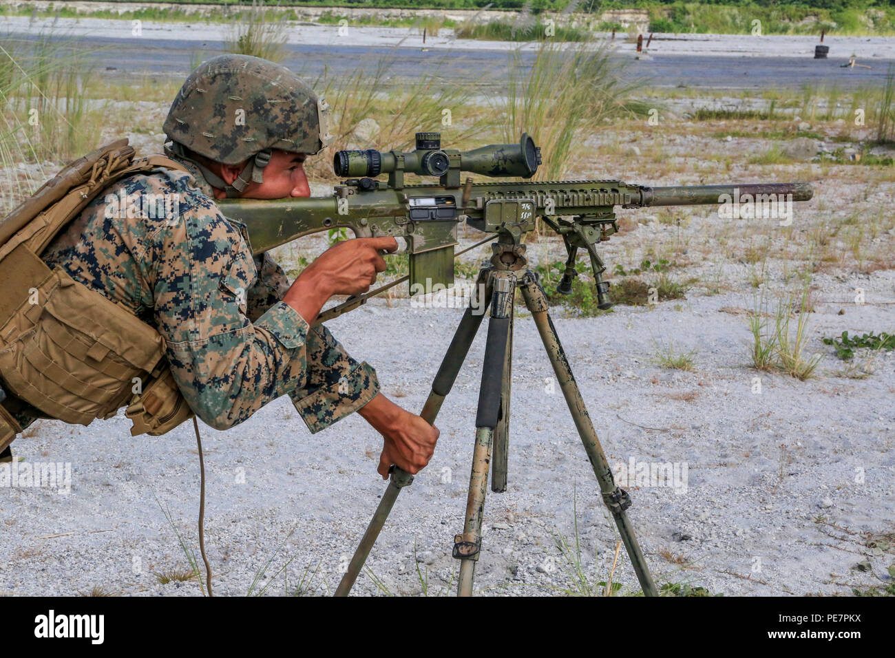 U. S. Marine Cpl. Wesley Waukau, a scout sniper with Battalion Landing ...