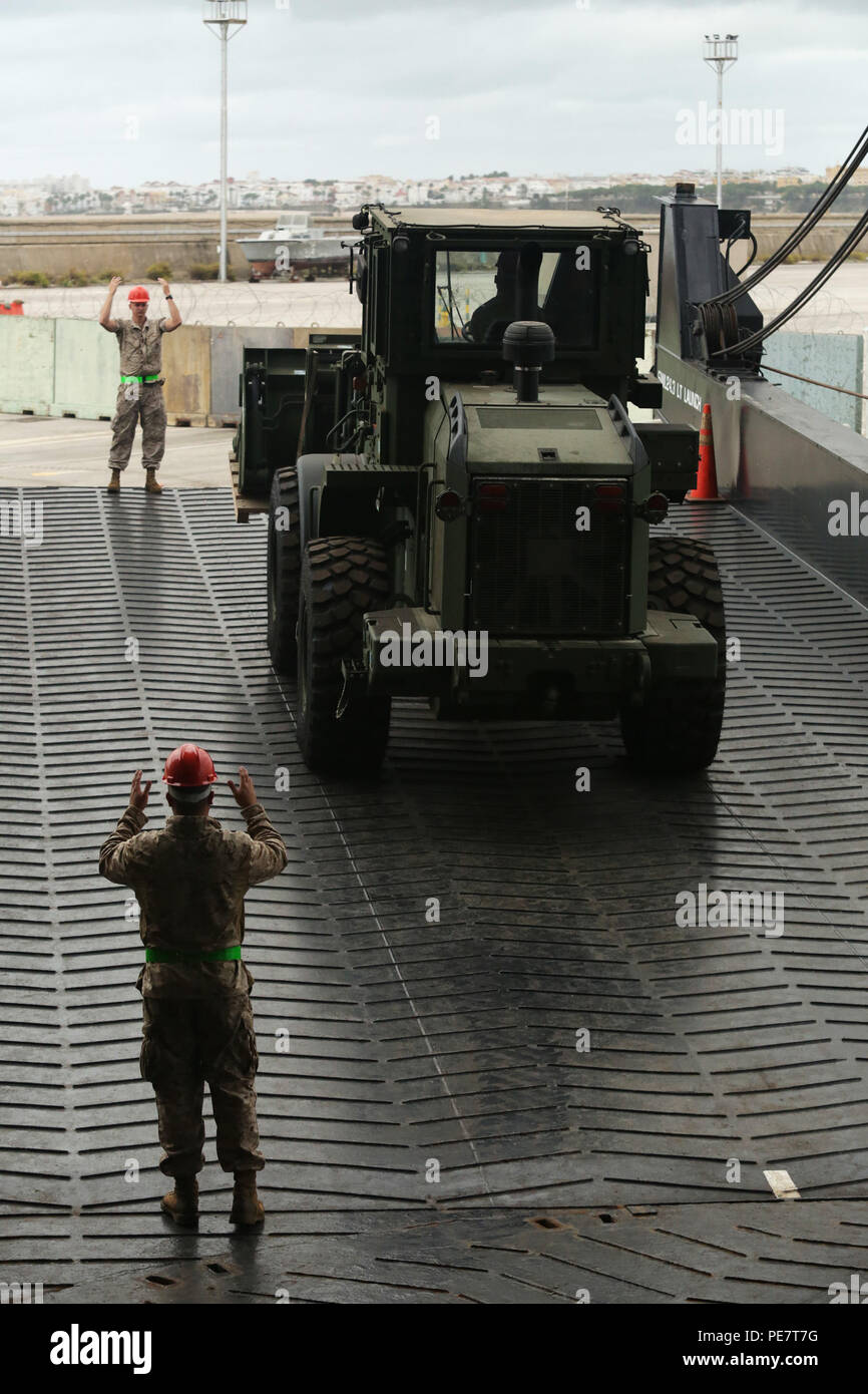 Marines from 4th Light Armored Reconnaissance Battalion unload more ...