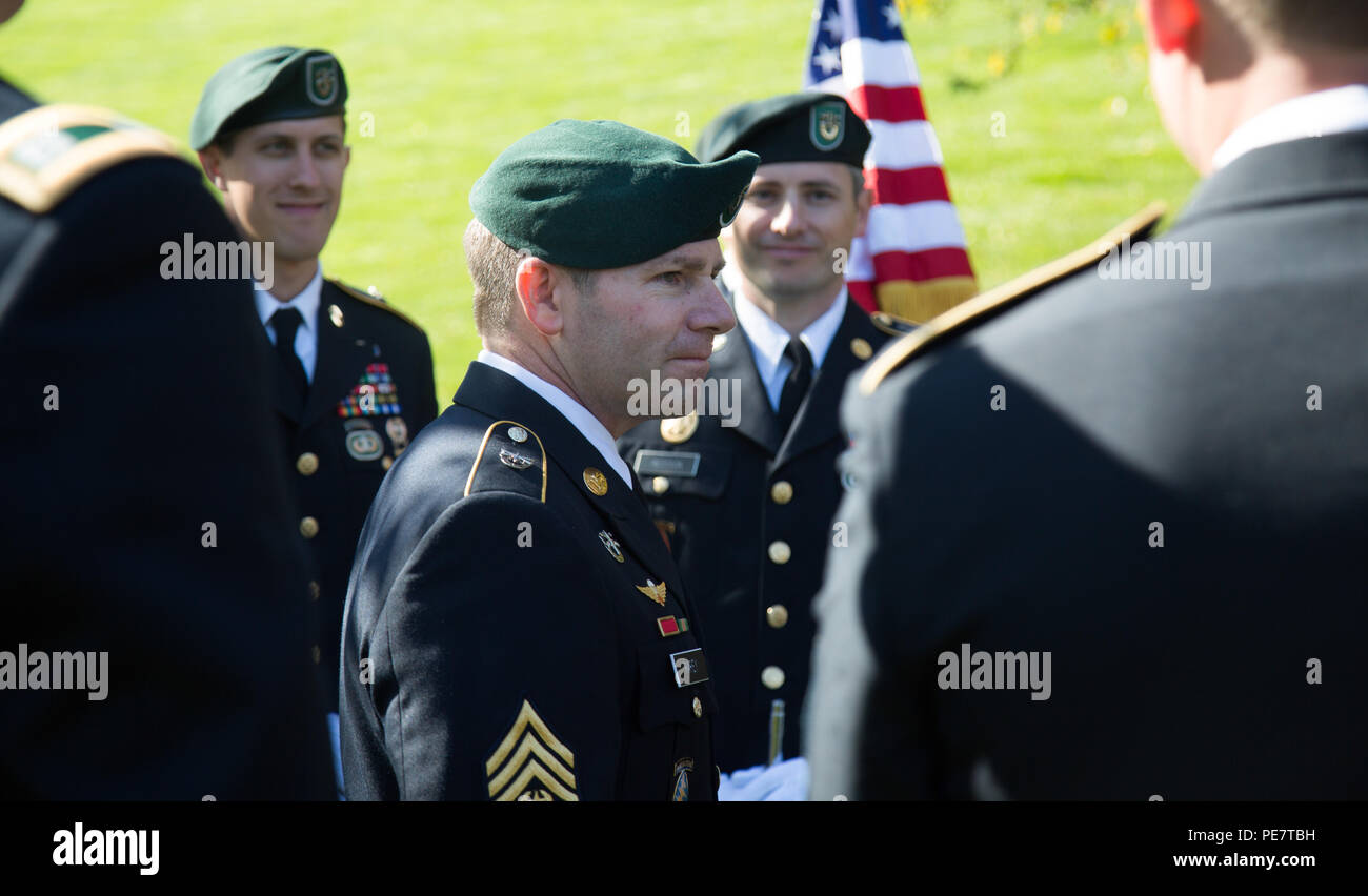U.S. Army Command Sgt. Maj. Brian Rarey prepares for the wreath-laying ...