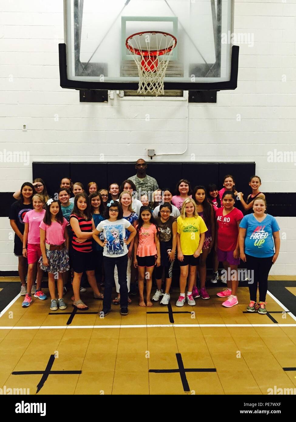Cpt. Harris take pictures with pen pals during recent visit to school ...