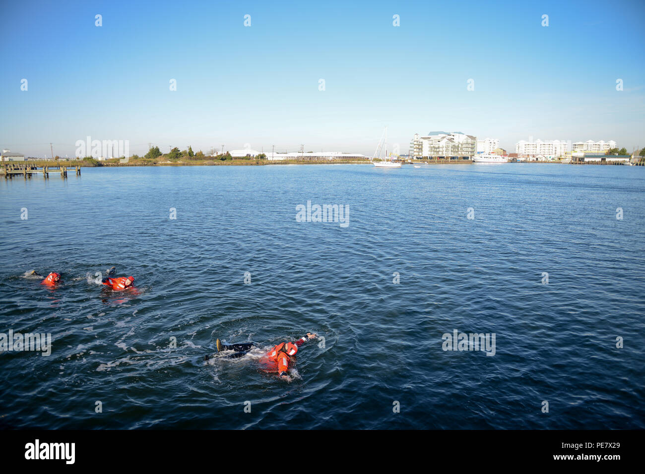 Crew members from the Coast Guard Station and Aids to Navigation Team ...