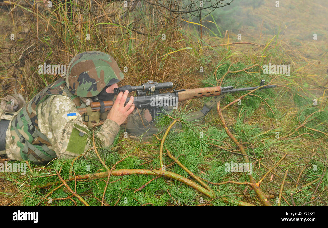 A soldier with the Ukrainian national guard provides security Oct. 22 ...