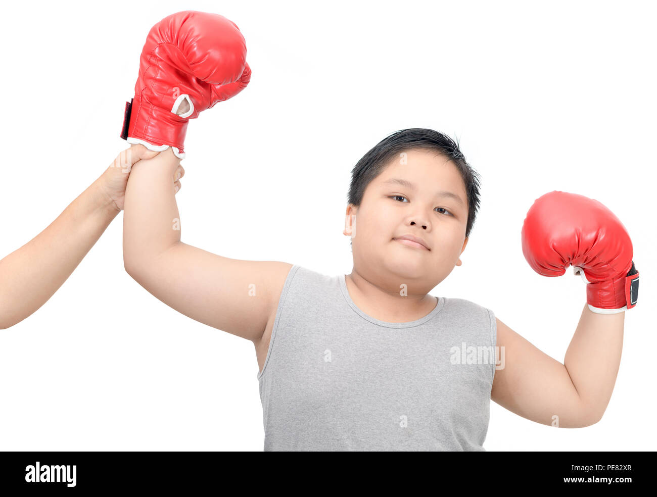 Boxing champion fat child boy gesturing for first place victory triumph ...