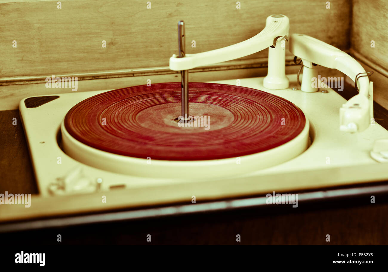 an ancient red record player Stock Photo - Alamy