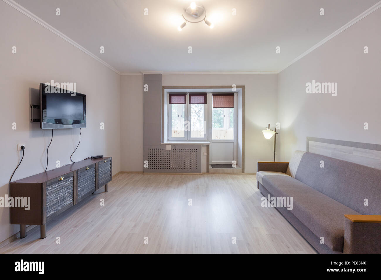 Small and light studio apartment interior Stock Photo - Alamy