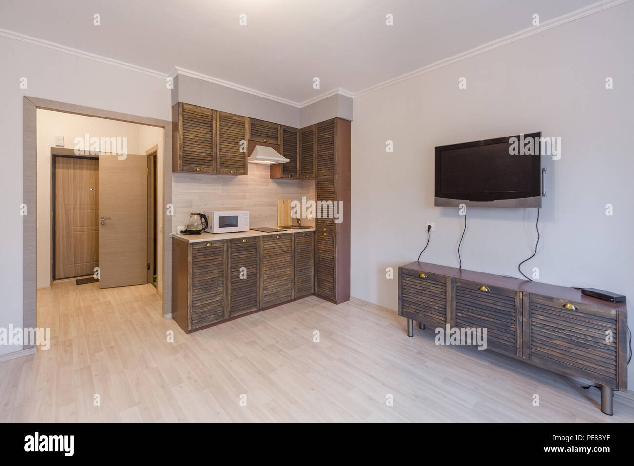 Small and light studio apartment interior Stock Photo - Alamy