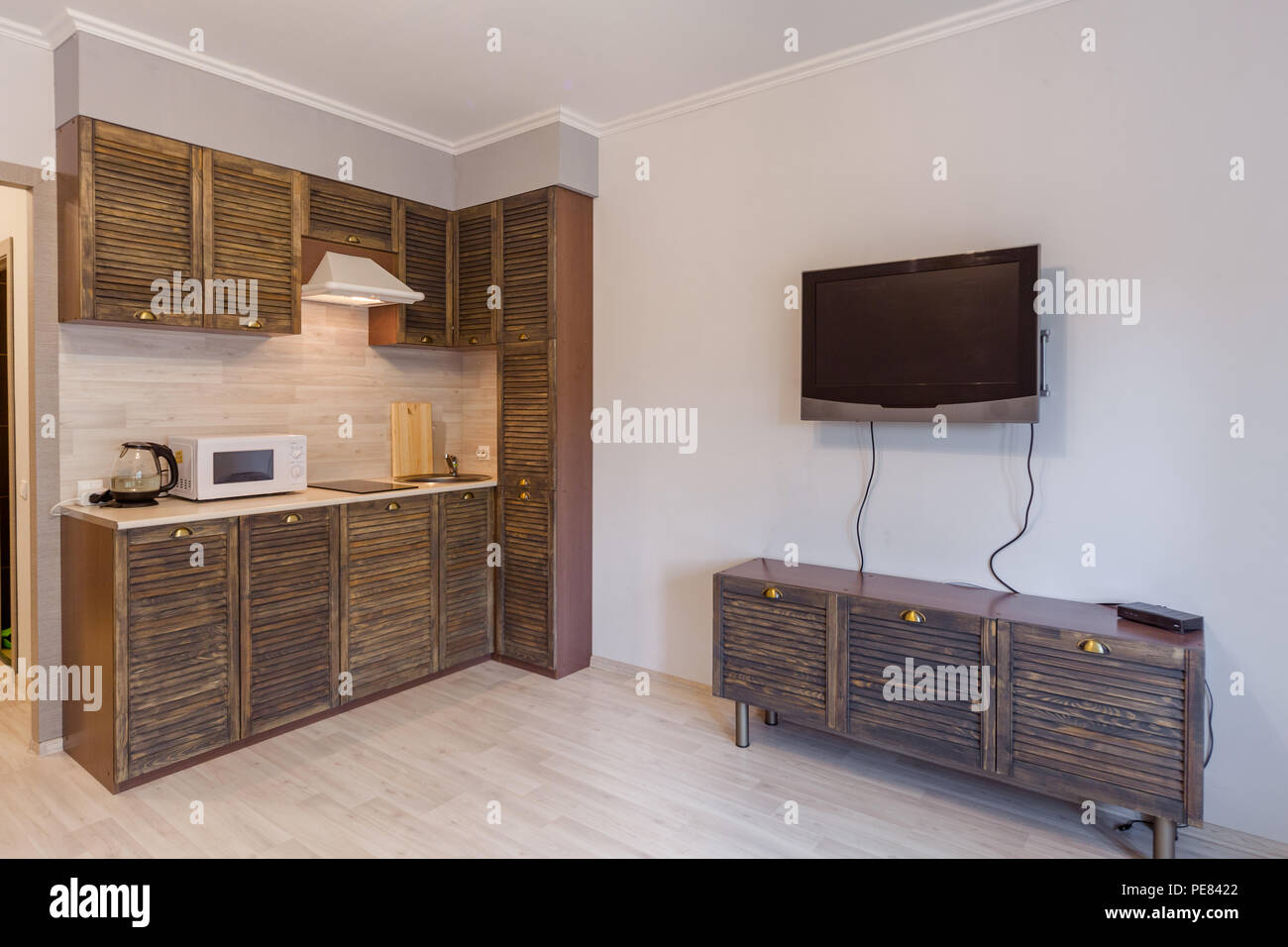 Small and light studio apartment interior Stock Photo - Alamy