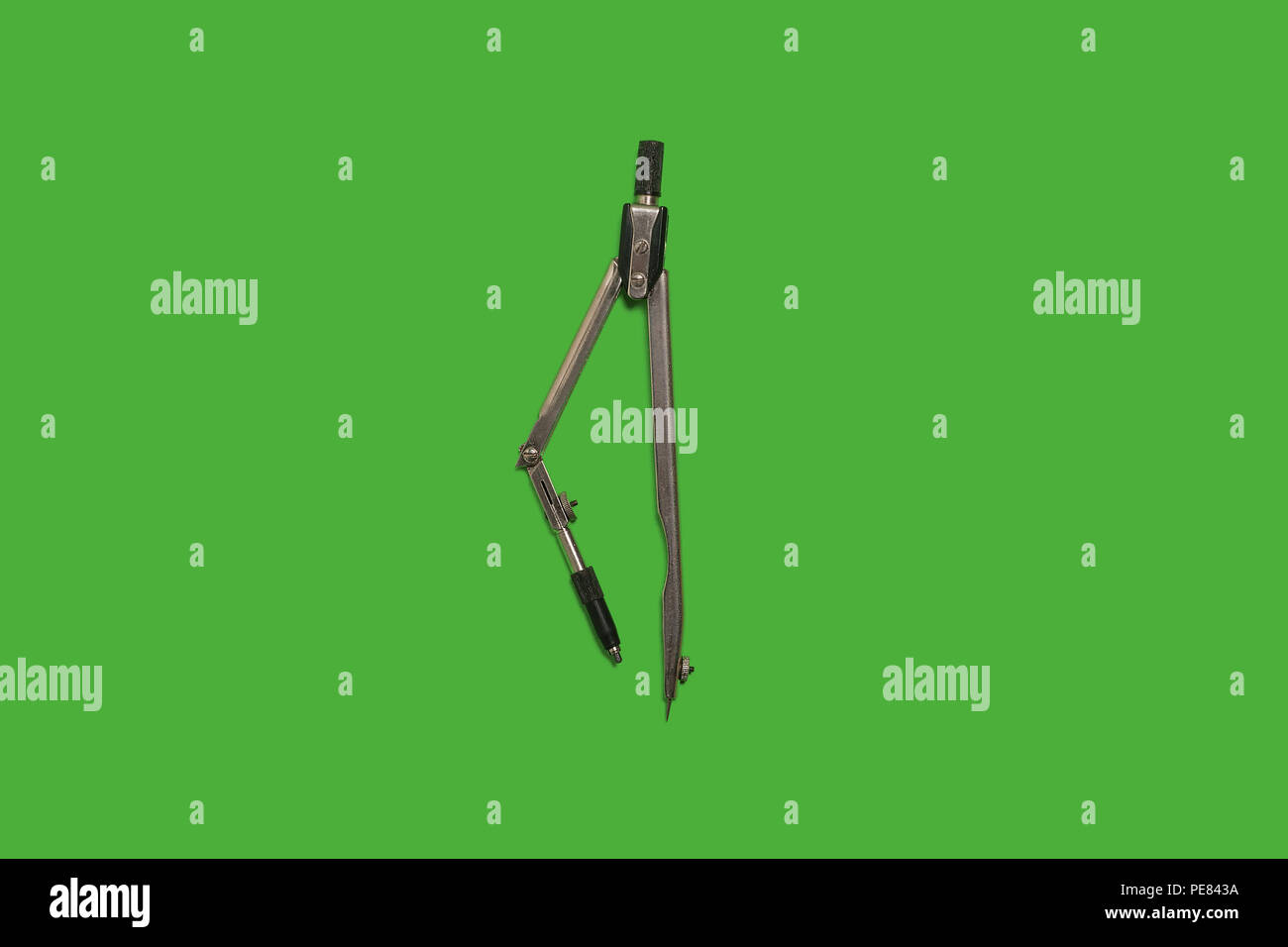 calipers on a green surface Stock Photo - Alamy