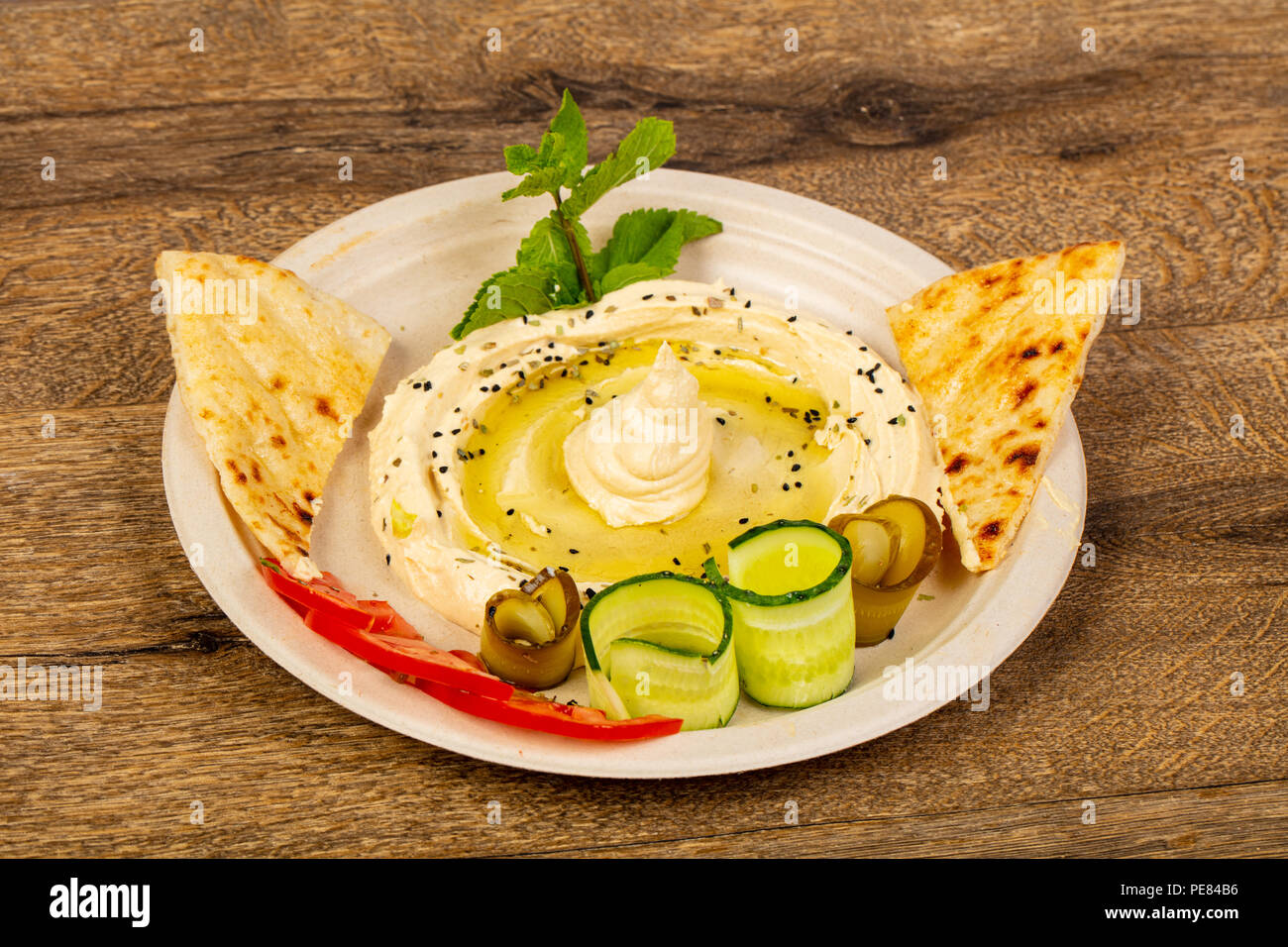 Traditional humus with oil and pita bread Stock Photo - Alamy