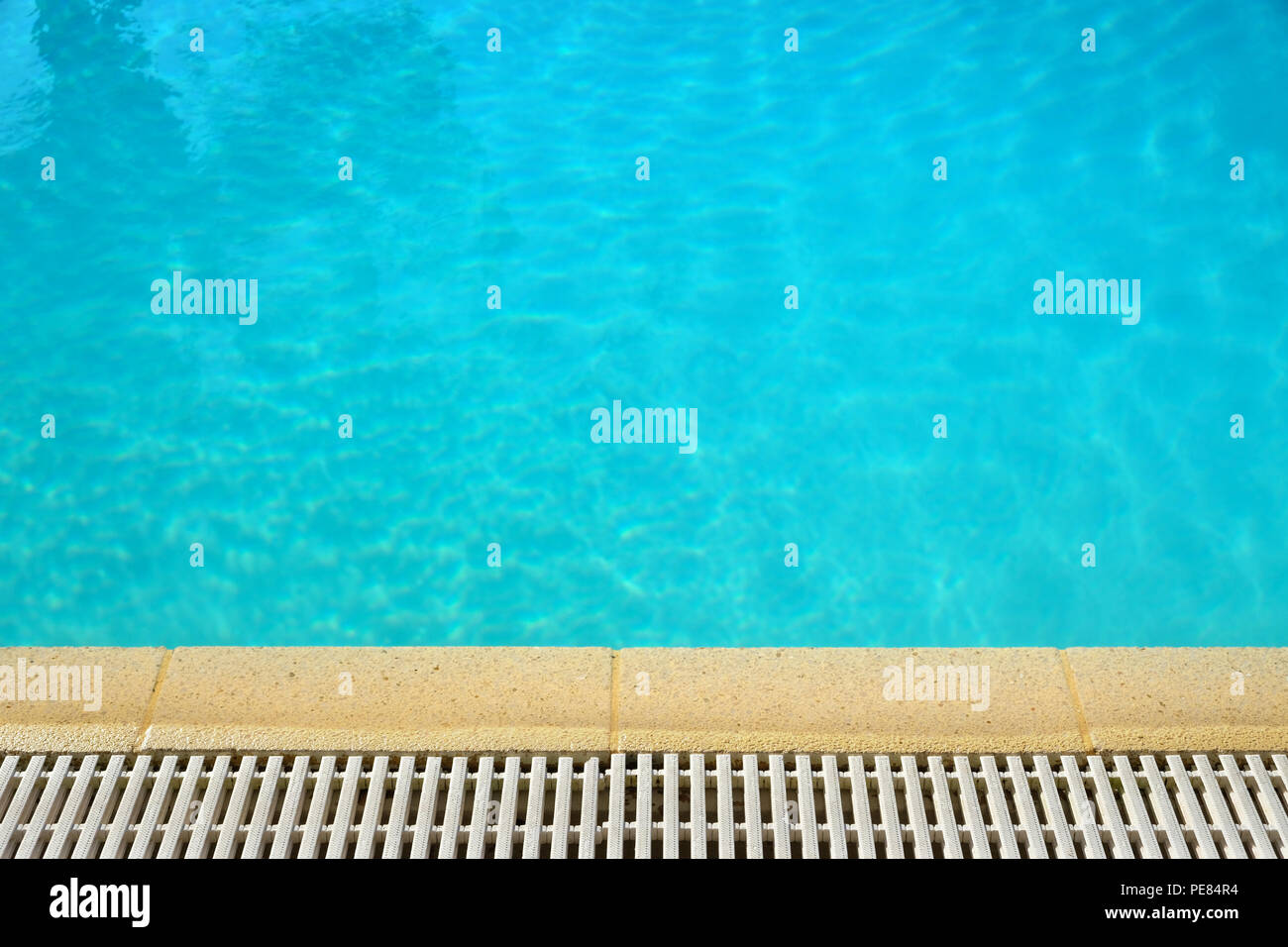 Swimming pool water surface edge background Stock Photo - Alamy