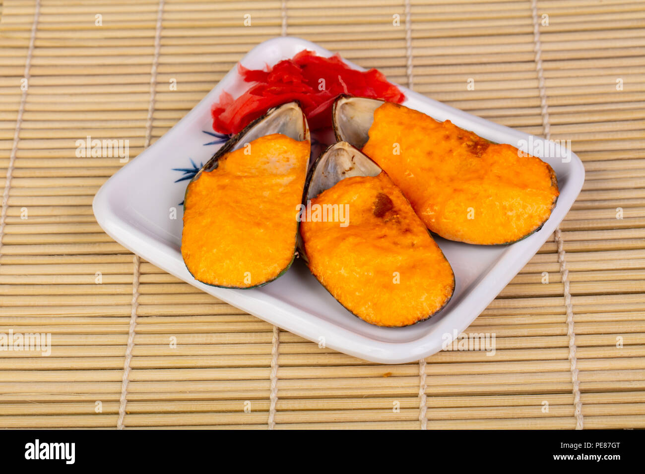 Deep fried mussels with ginger Stock Photo - Alamy