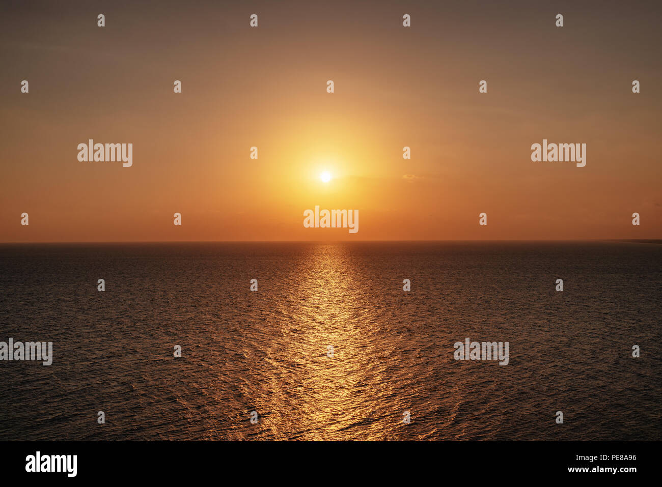 Beautiful sunset over the ocean. Sunrise in the sea Stock Photo - Alamy