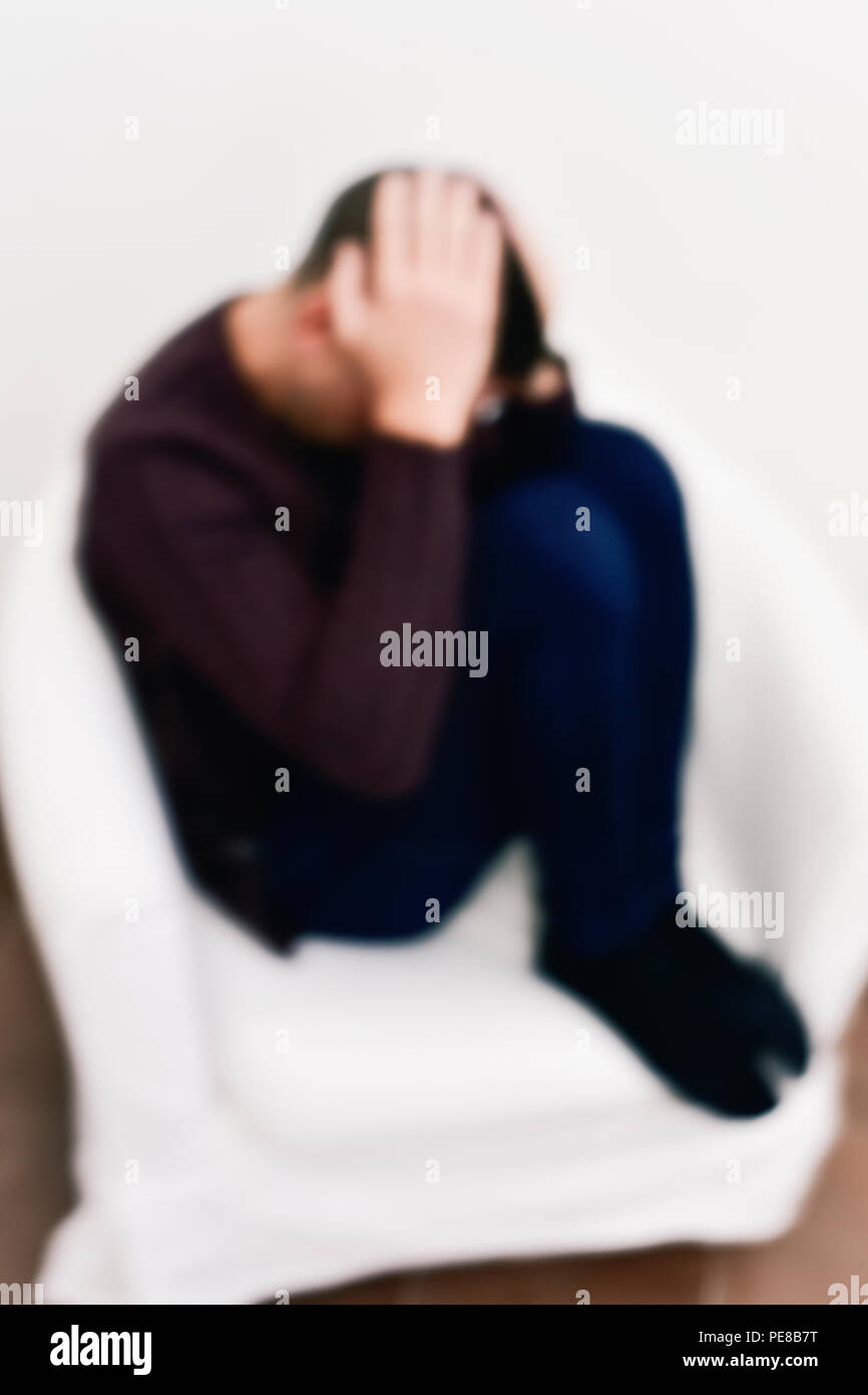 Man curled up hi-res stock photography and images - Alamy