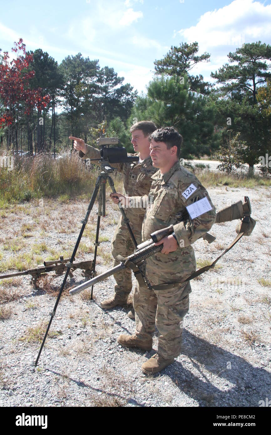 Staff Sgt. Desmond McClellan (near) and Sgt. Cameron Pope (far), of 3rd ...