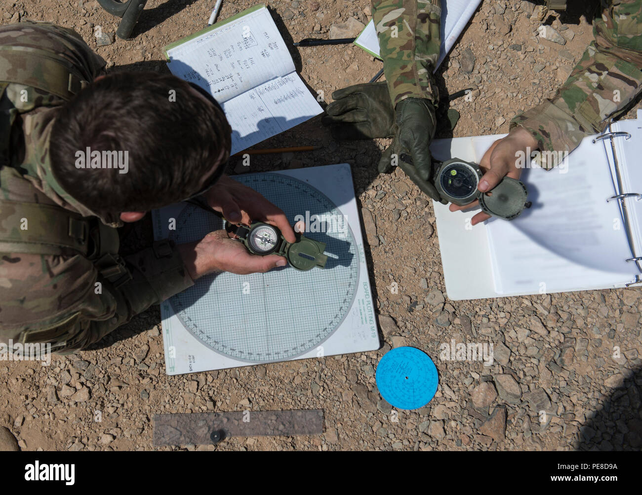 U.S. Army Staff Sgt. Joshua Matzdorf, mortar section leader, left, and ...